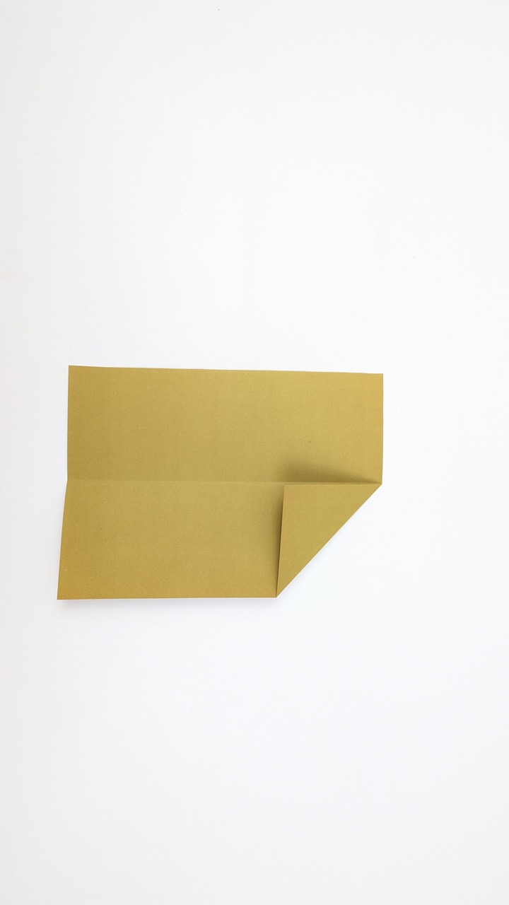 How to Fold a Paper Airplane — Step by Step with Photos